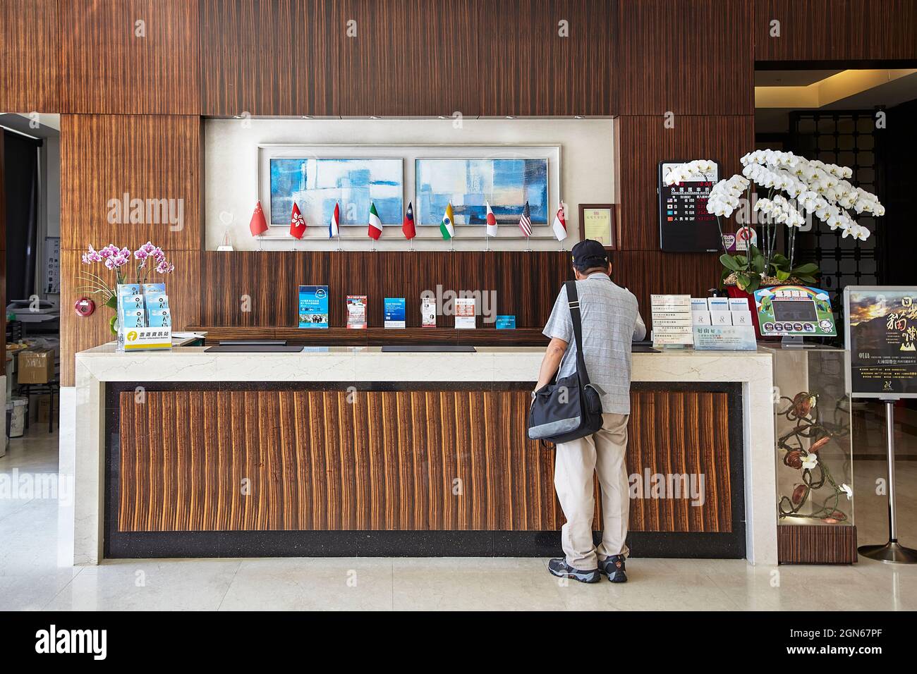 View of the Reception counter of a hotel Stock Photo - Alamy