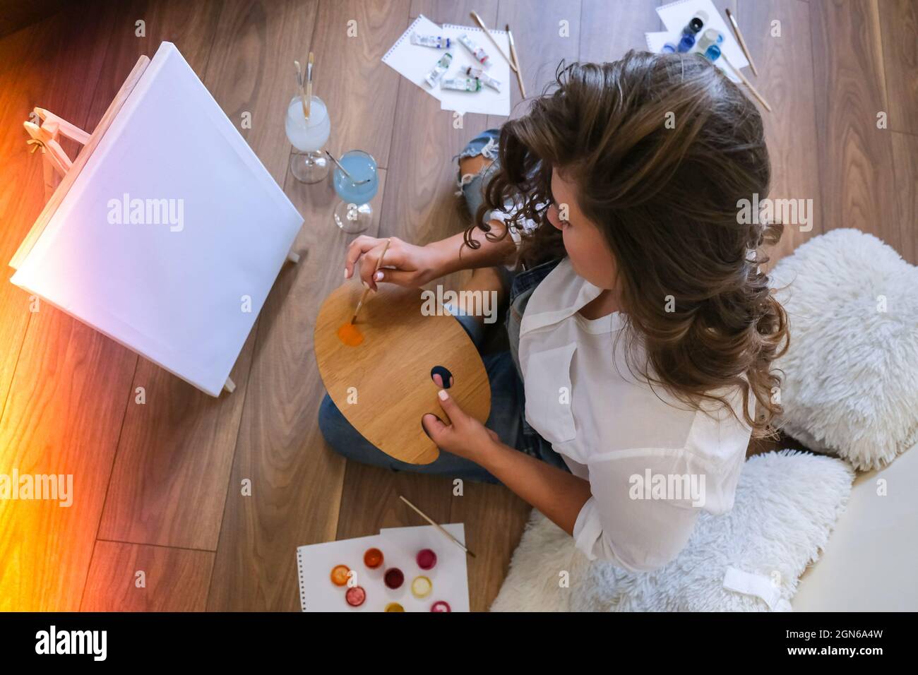 Creative painter in working process. Artist workplace, hobby, craft ...