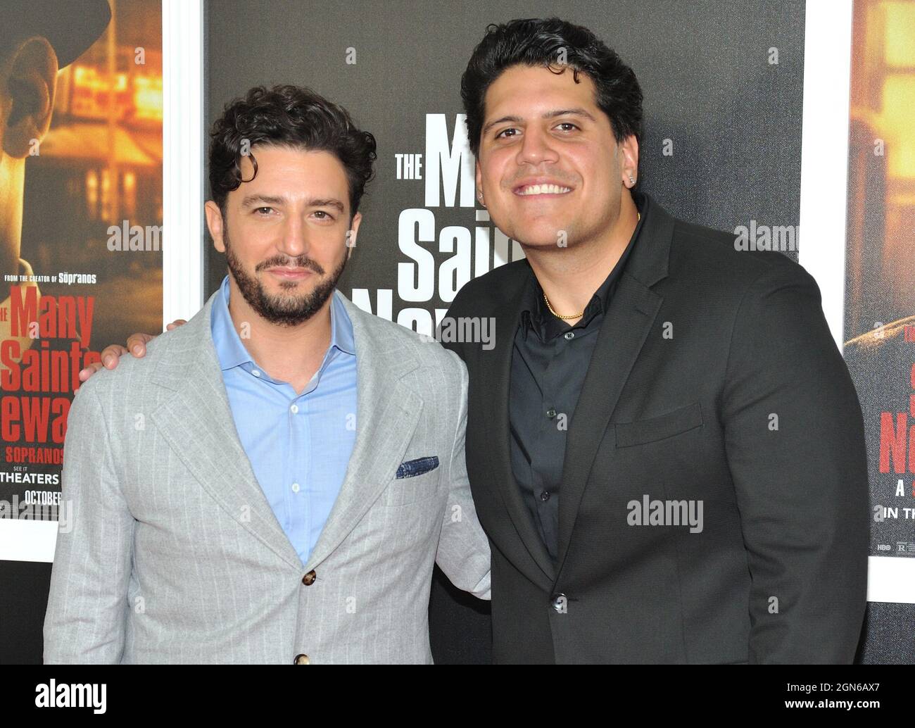 L-R: John Magaro and Samson Moeakiola attend the premiere of The Many ...
