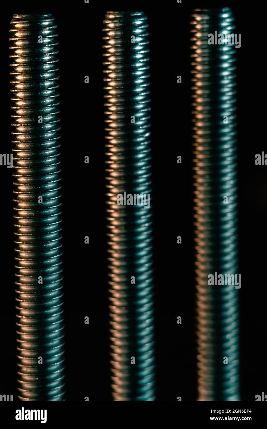 Closeup of the metal silver bolts against the dark background Stock ...