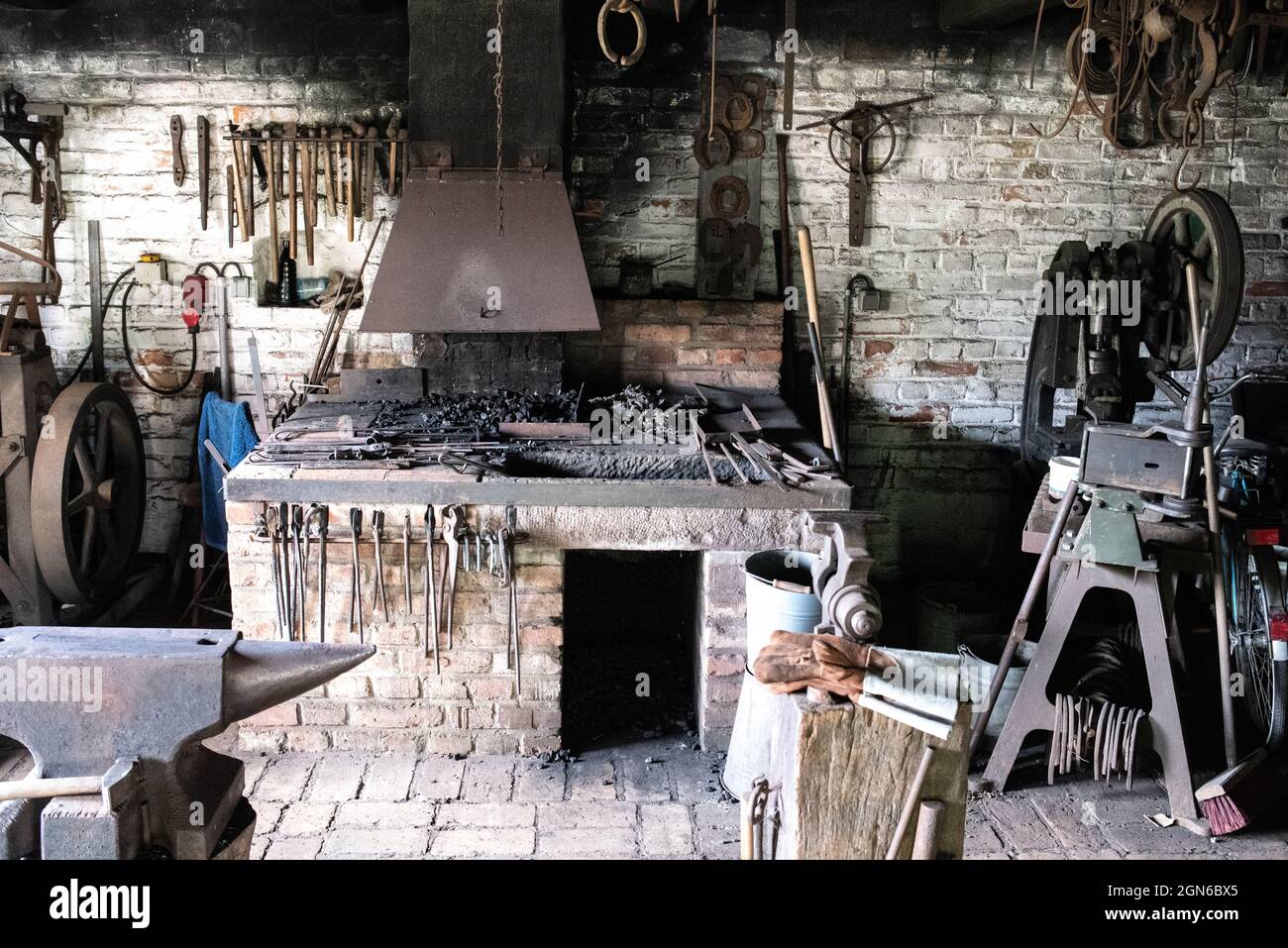 High angle shot of a blacksmith workshop with lots of instruments and ...