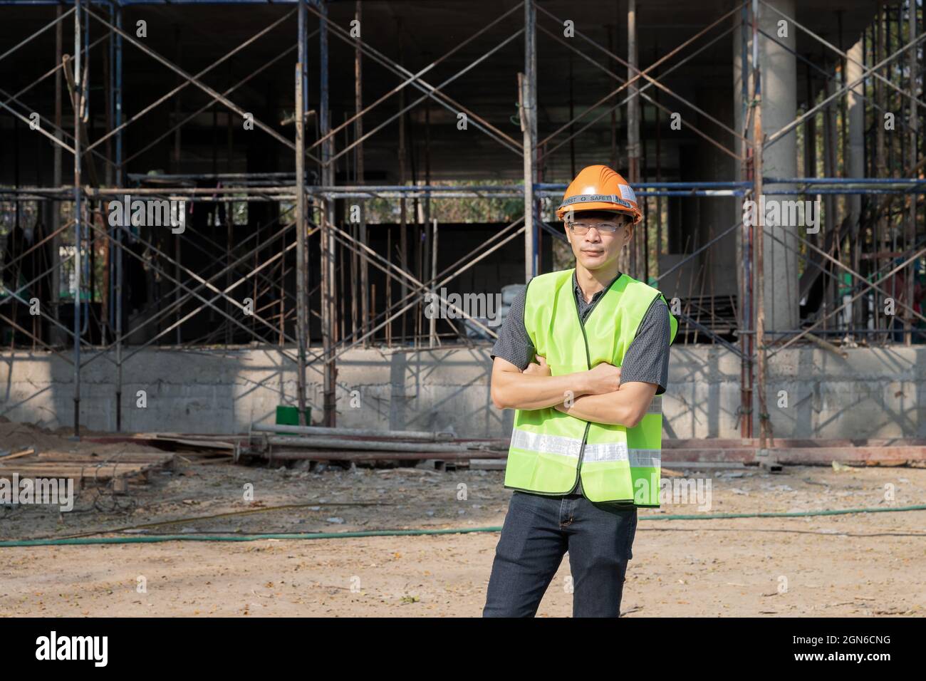 Successful male architect, engineer or contractor at a building site ...