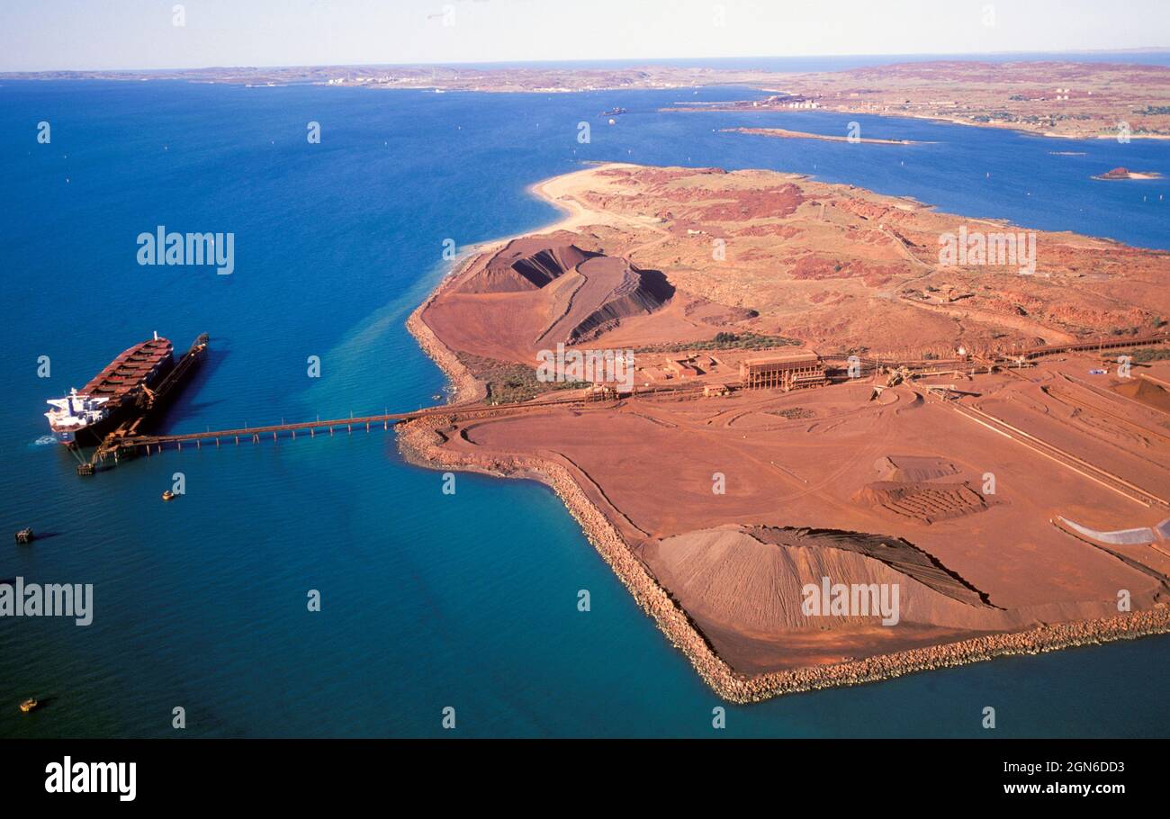 Loading iron ore at Dampier on the Western Australian coast Stock Photo ...
