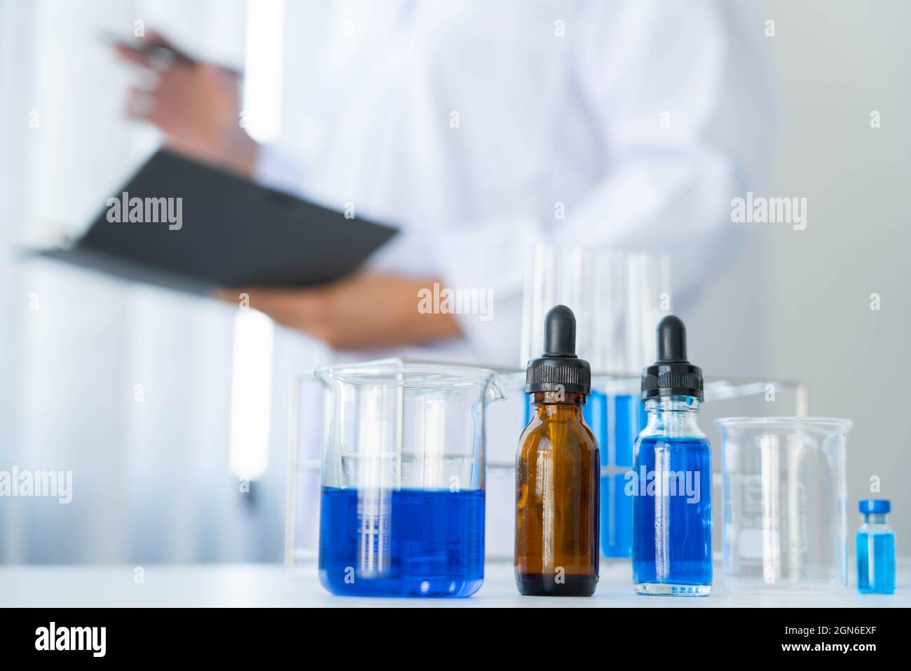 Scientist wear lab coat and protective wear are working with research ...