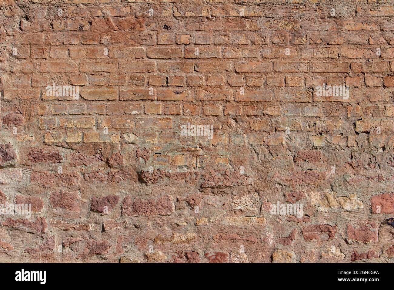 Reddish brown color European medieval stone and brick wall texture ...