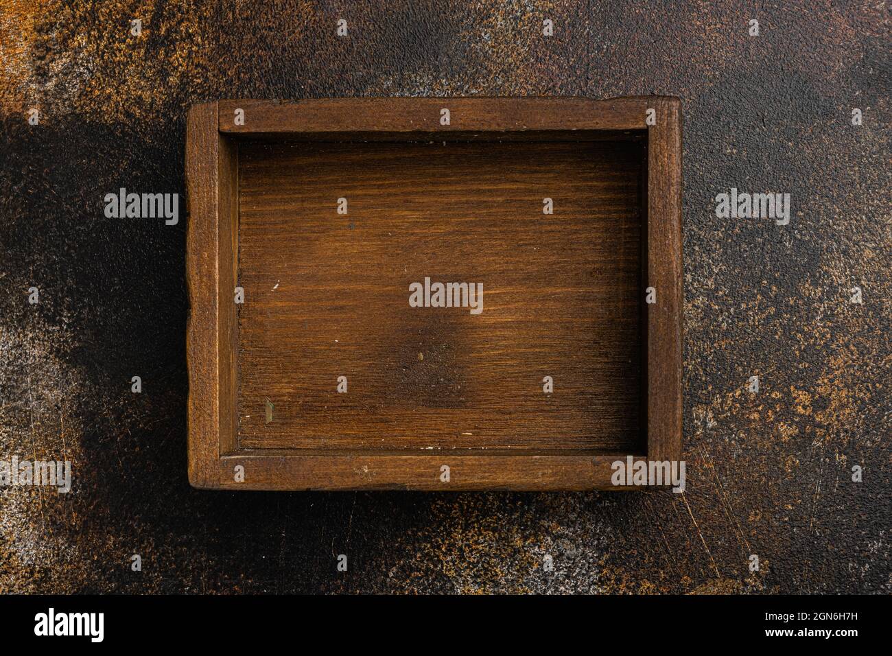 Empty dark wooden box set with copy space for text or food, top view ...