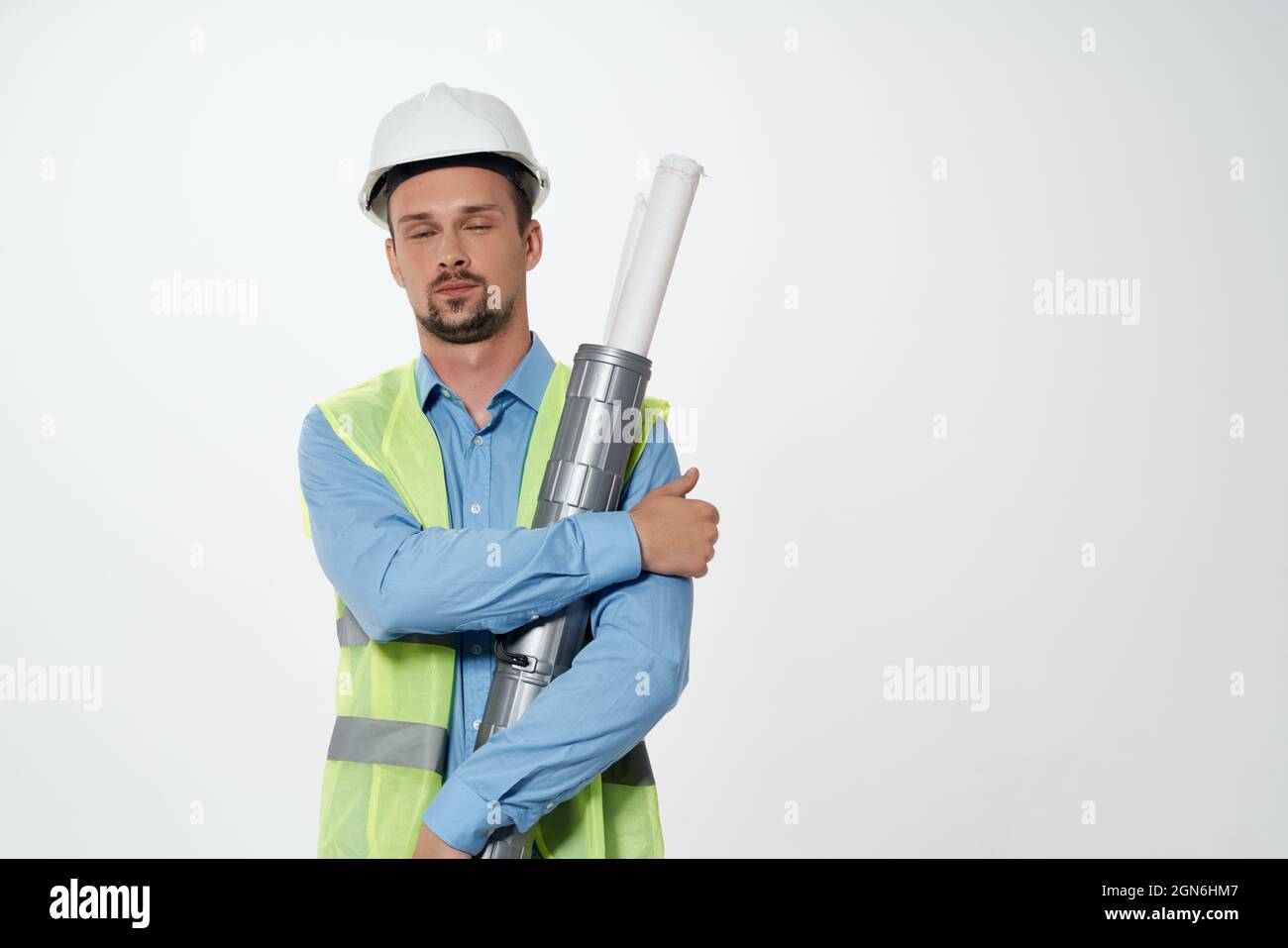 male builder drawings in hand construction industry light background ...