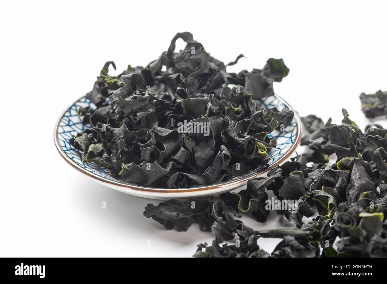 Dehydrated Sea mustard on white background，Undaria pinnatifida Suringar ...