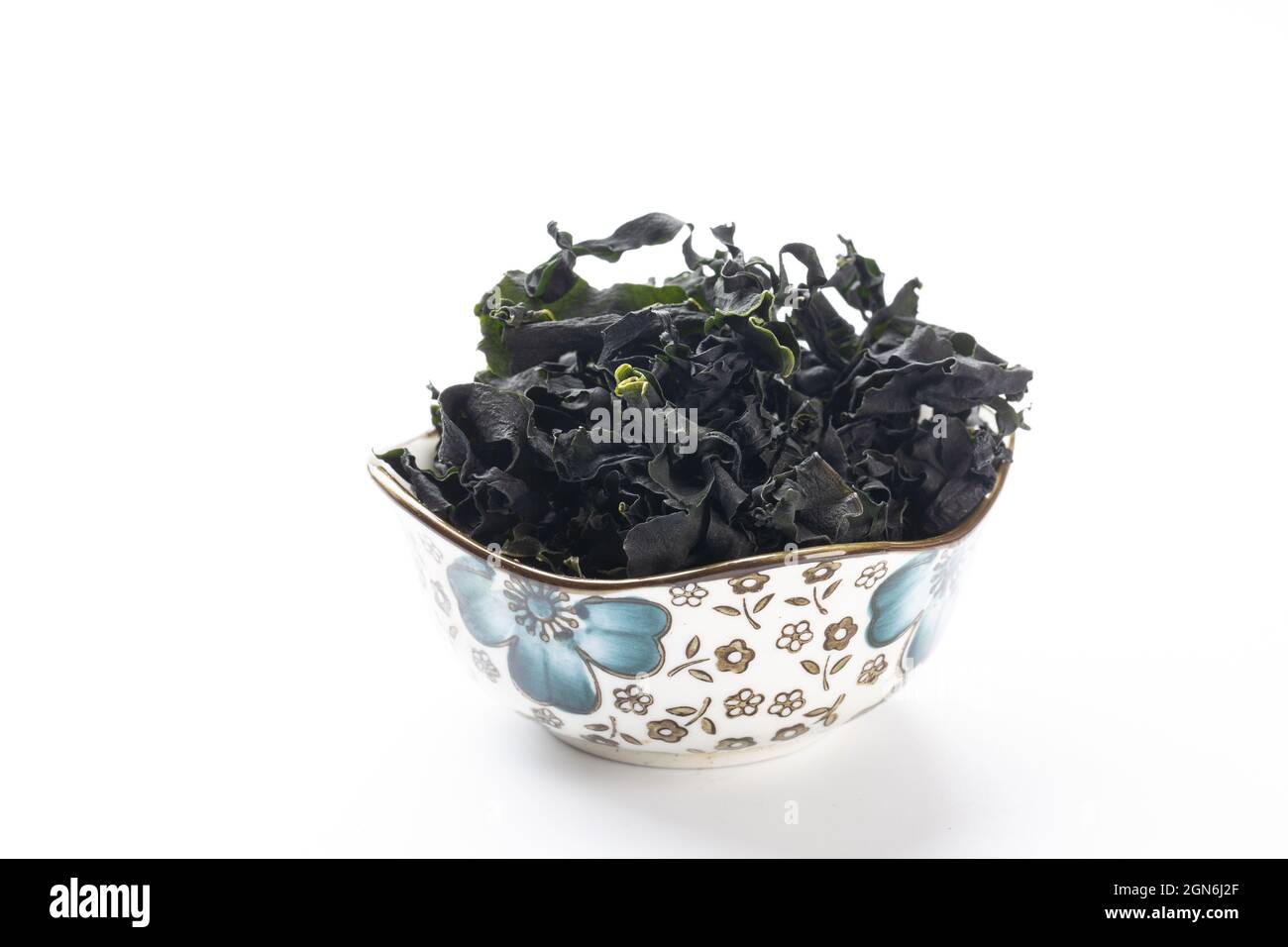 Dehydrated Sea mustard on white background，Undaria pinnatifida Suringar ...