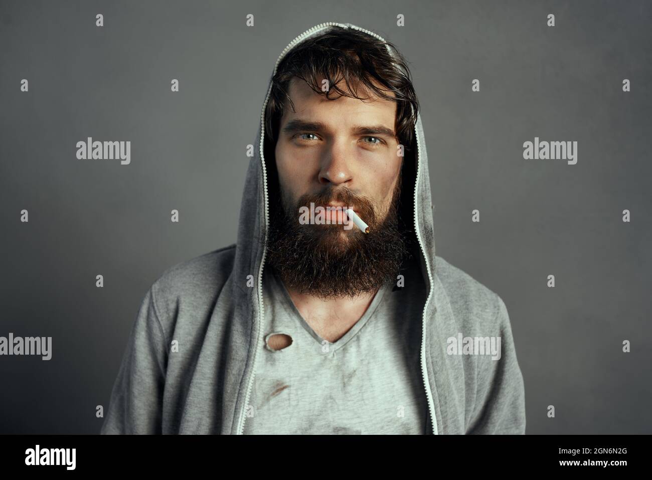 poor man with a beard sign help the tramp lifestyle Stock Photo - Alamy