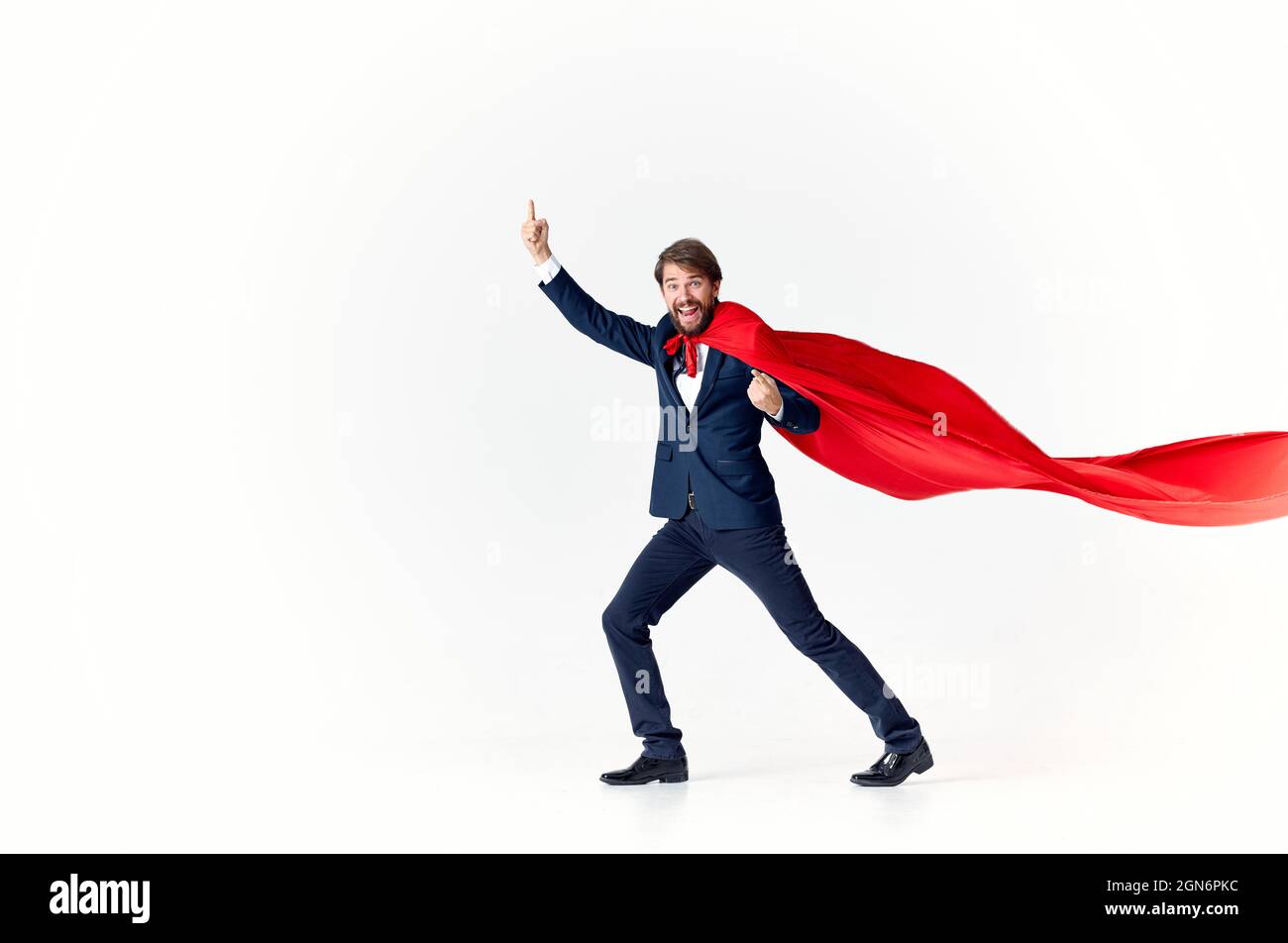 man wearing red cape superman jump Stock Photo - Alamy