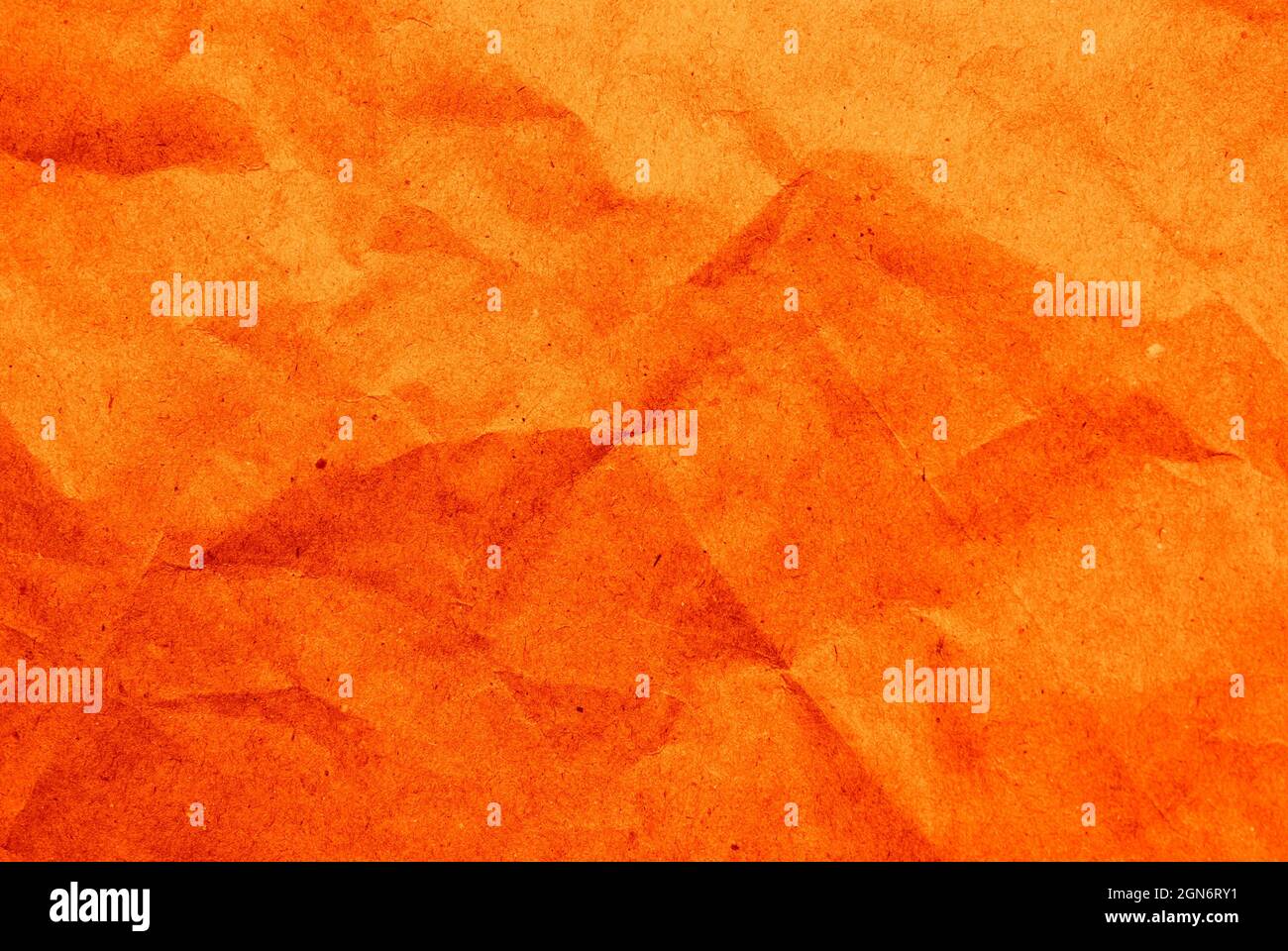 background of orange crumpled paper Stock Photo - Alamy