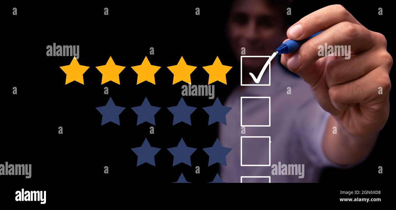Young man giving 5 stars top rating feedback Stock Photo - Alamy