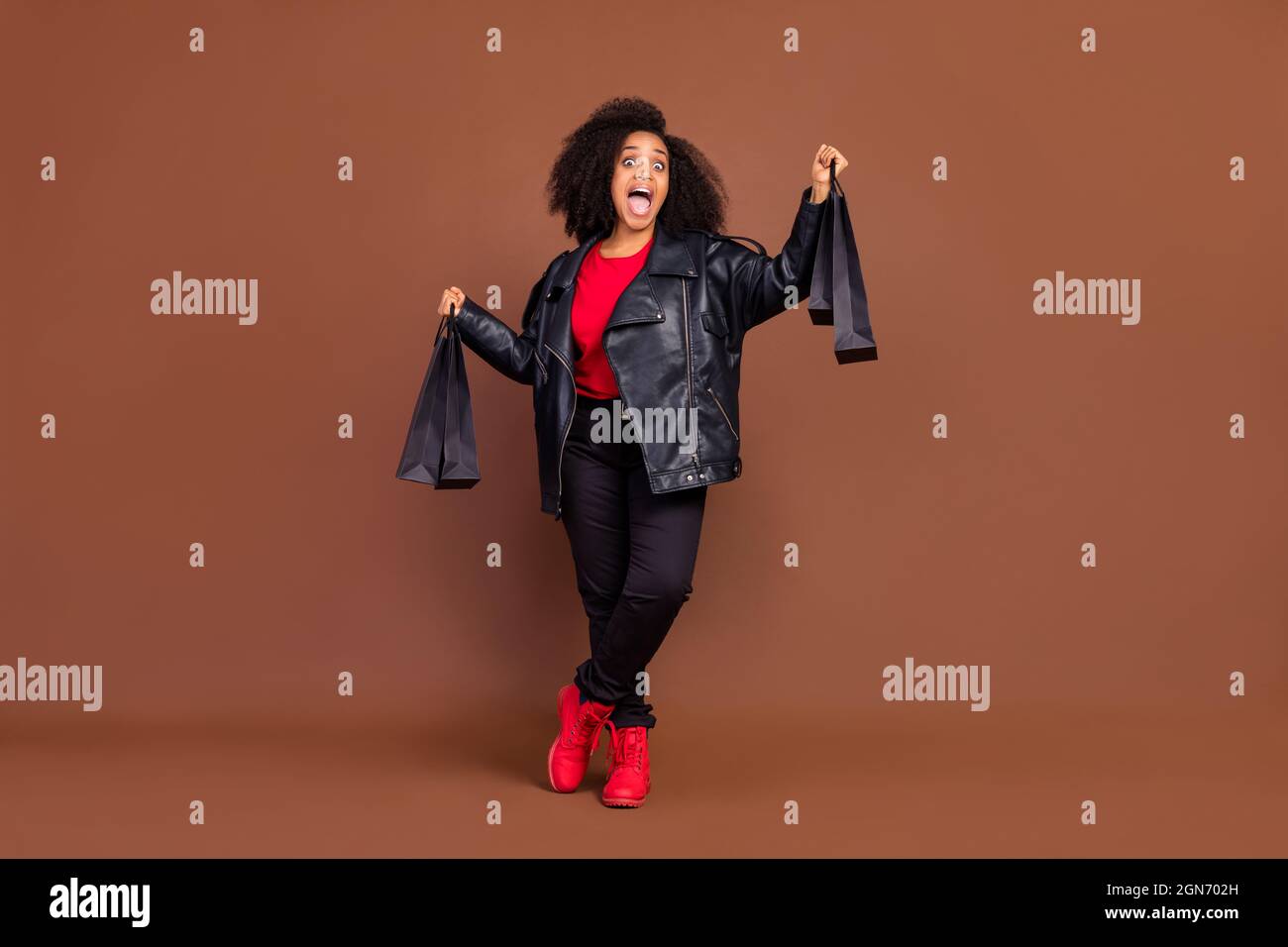 Full length portrait of carefree attractive cheerful person raise ...