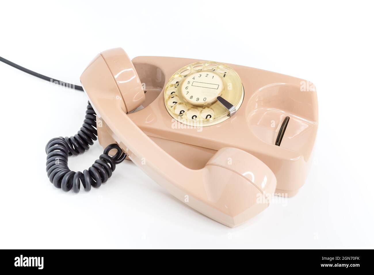 Vintage telephone. Pink old telephone isolated on white background ...