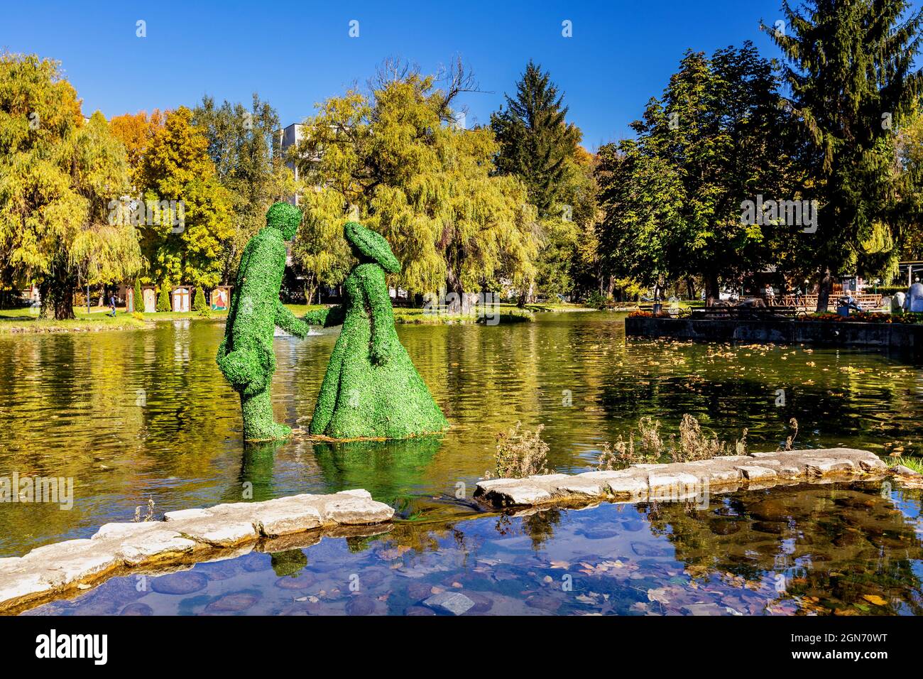 Razlog, Bulgaria - October 20, 2020: Lake, man and woman green leafs ...