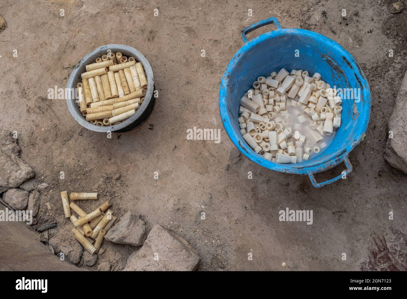 Separation of unclean and clean unfinished handmade bone crafts at The ...