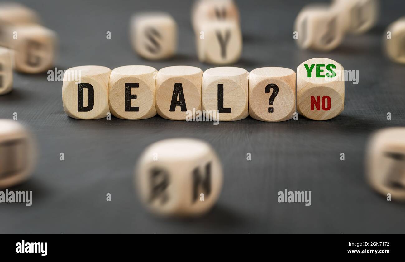Letter dice with the word Deal Yes or No Stock Photo - Alamy