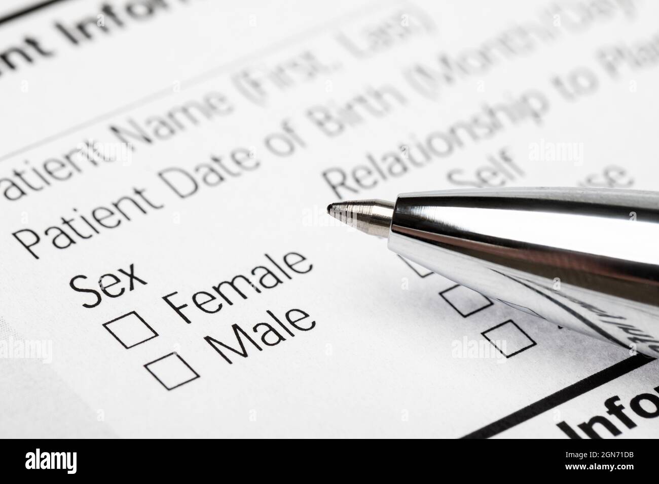 Pen over male female gender option checkboxes in a document form Stock ...