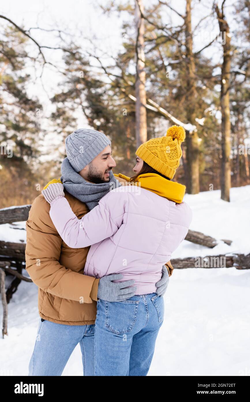 Side view attractive couple hugging hi-res stock photography and images ...
