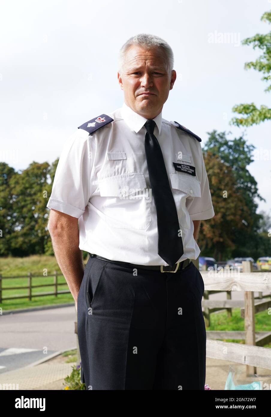 Chief Superintendent Trevor Lawry by the floral tributes at Cator Park ...