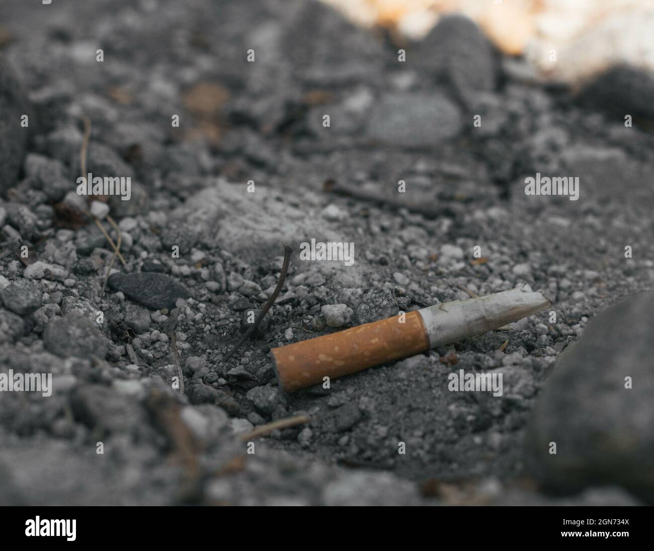 Cigarette on the ground hi-res stock photography and images - Alamy