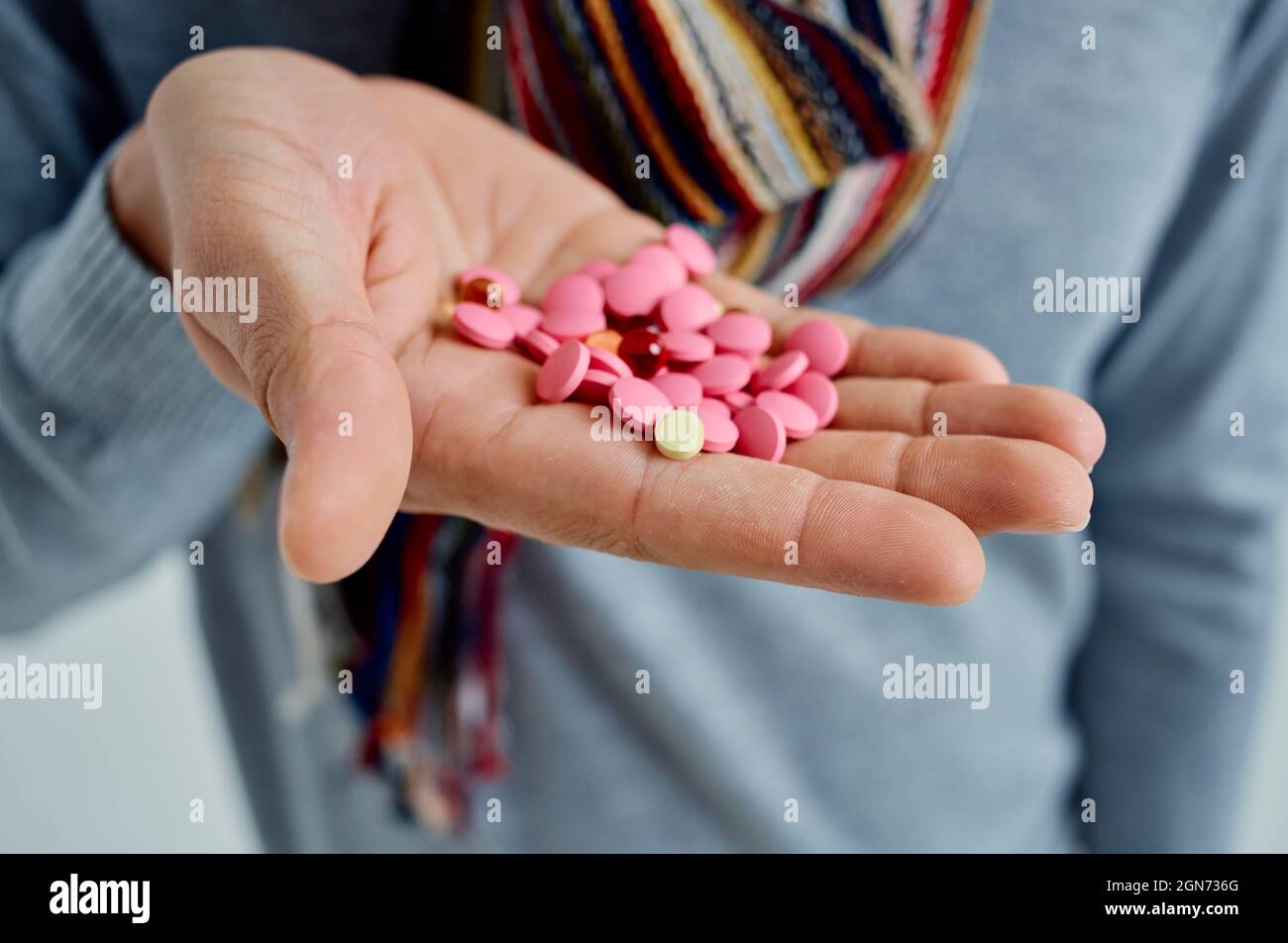 sick man with a scarf around his neck flu health problems light ...