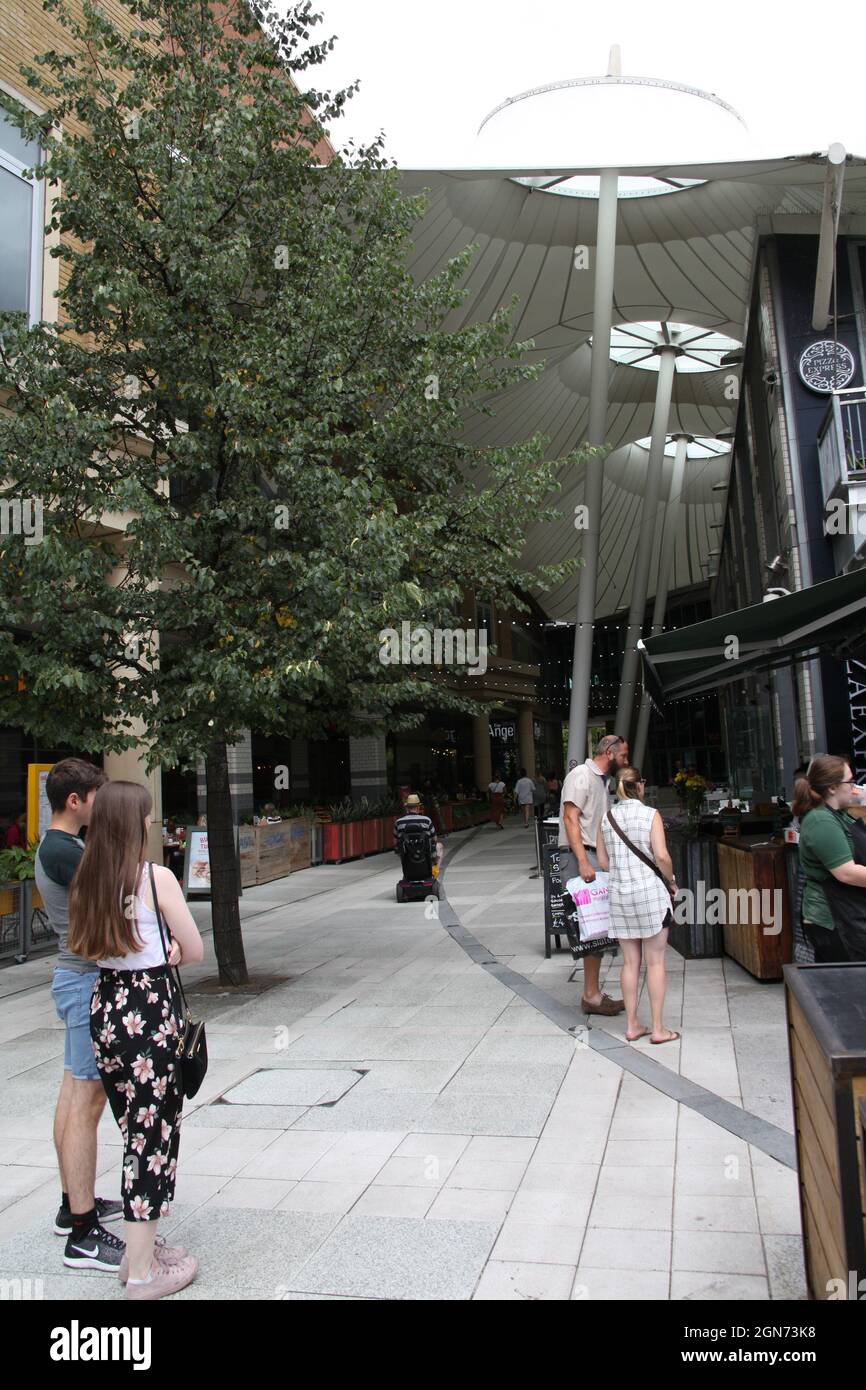 People browse the shops at The Festival Place Shopping Mall in ...