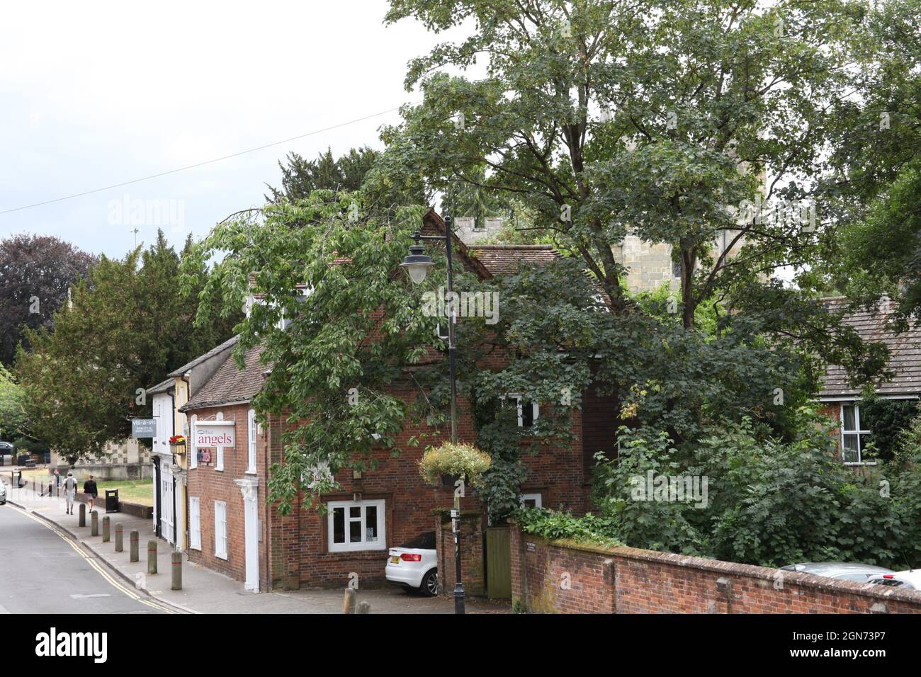 A view of the buildings on Church Street in Basingstoke, Hampshire in ...