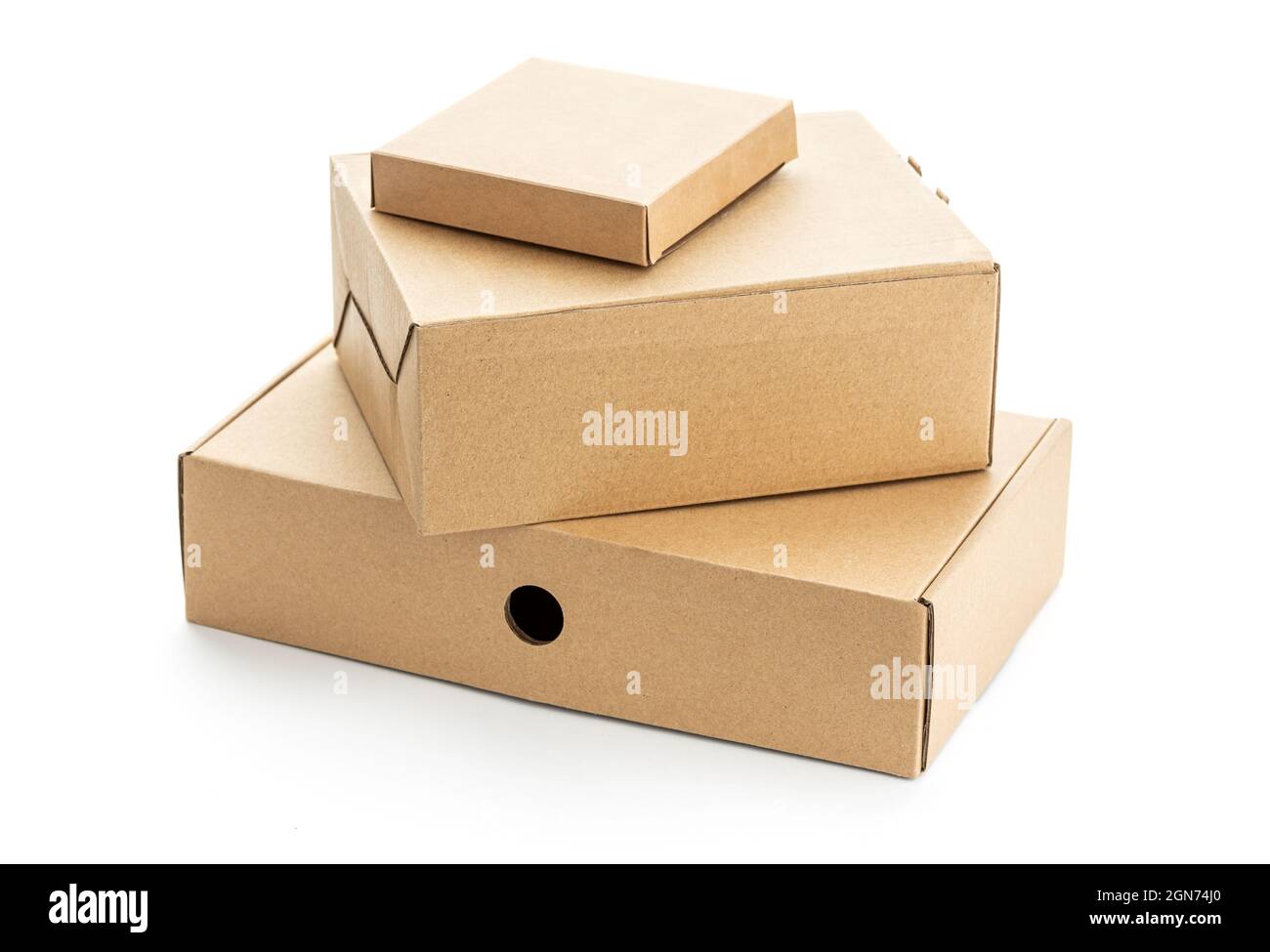 Group of stacked cardboard box isolated on white background Stock Photo ...