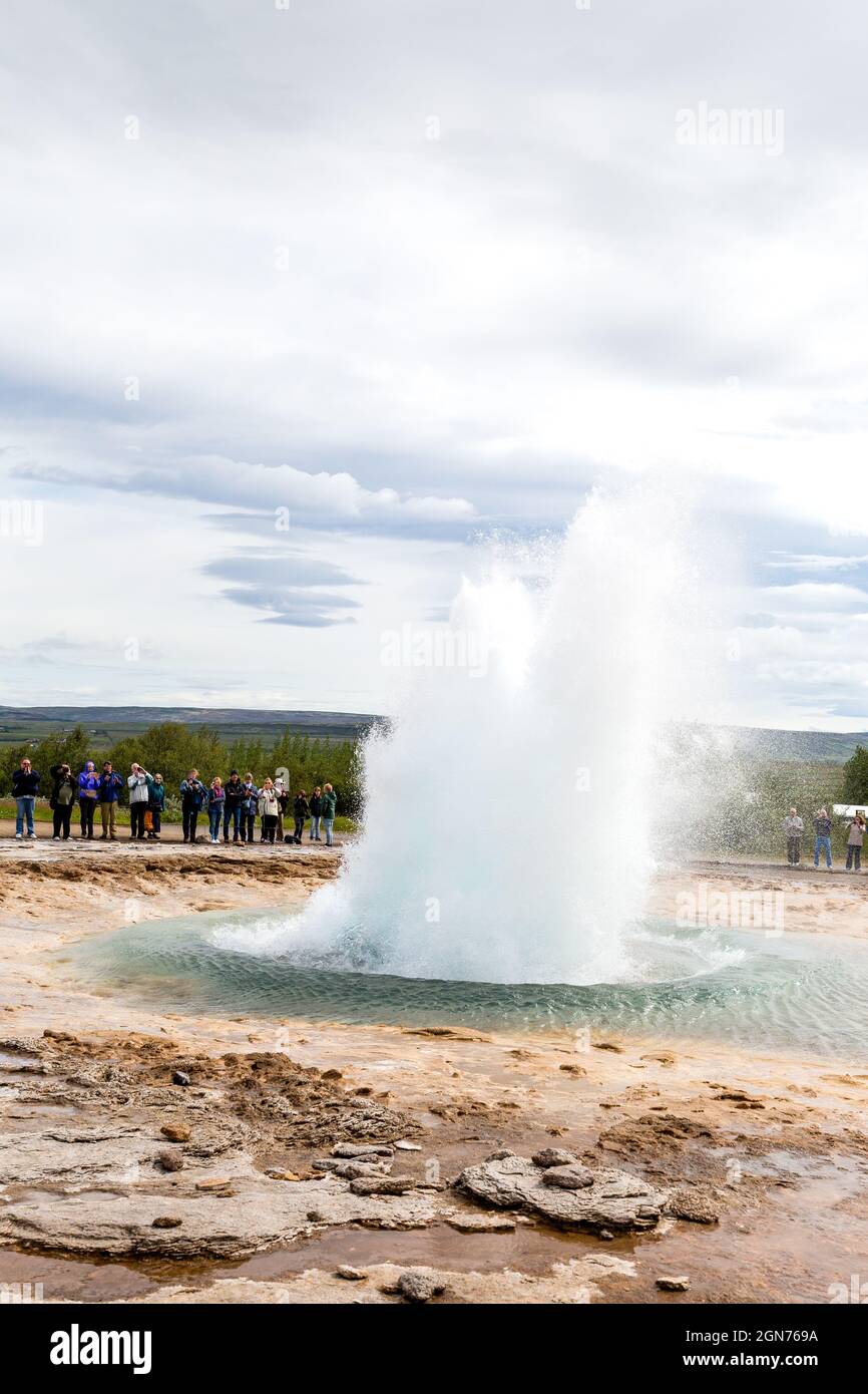 strokkur, a geyser, at a geothermal area beside the Hvítá River in ...