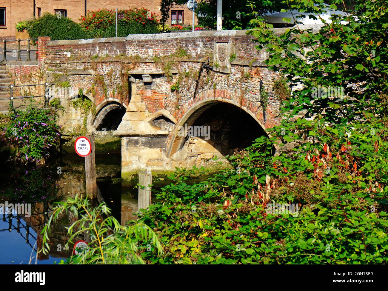 A view of the 14th century Bishop Bridge over the River Wensum from the ...