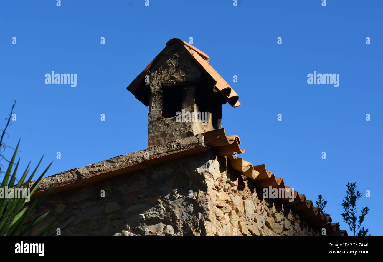 Chimney of a quarry stone house on the hiking trail from Port de Soller ...