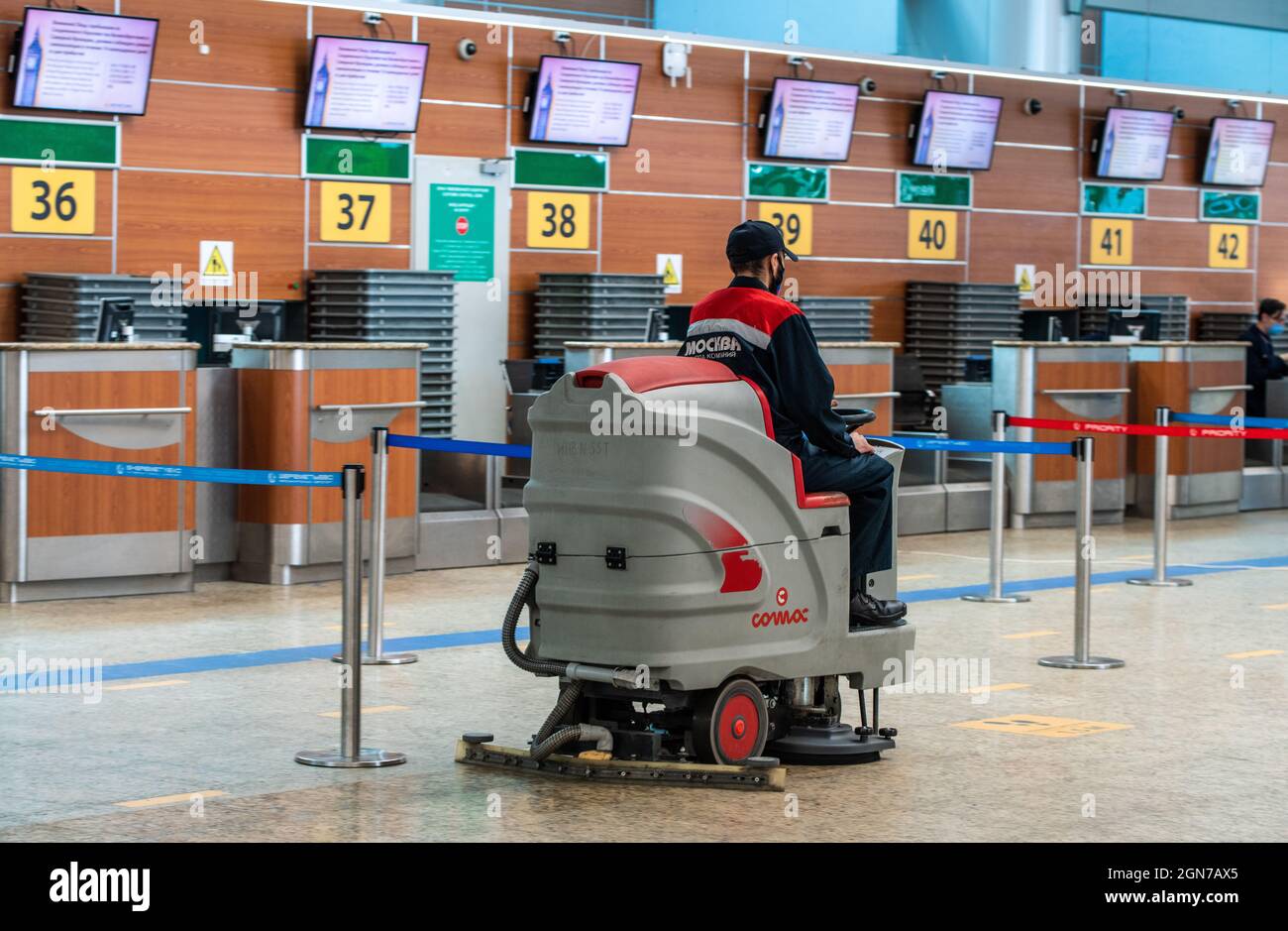 May 11, 2021, Moscow, Russia. A wedge service employee on a scrubber ...