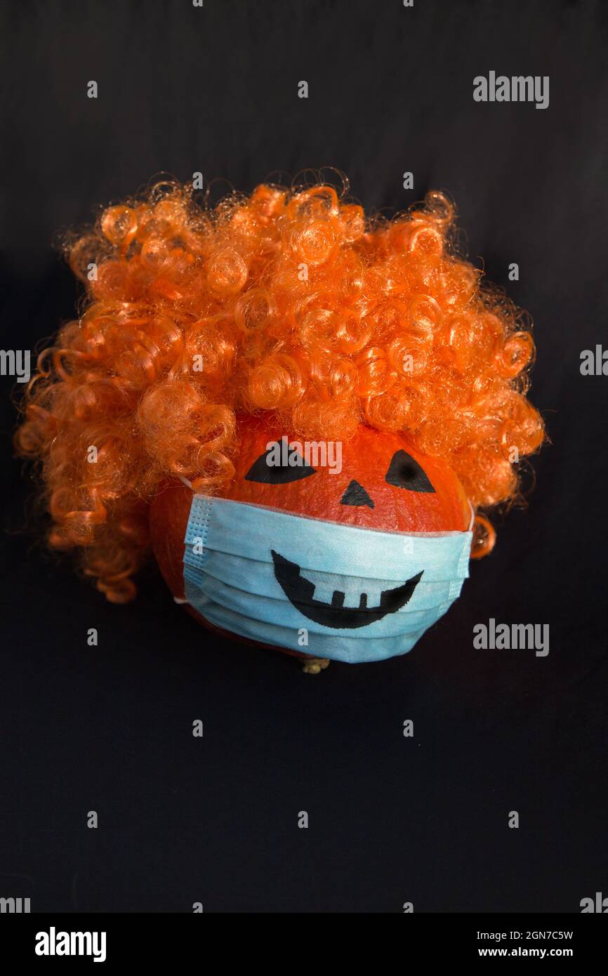 Halloween decorations in new reality of covid-19 pandemic. Pumpkin in ...