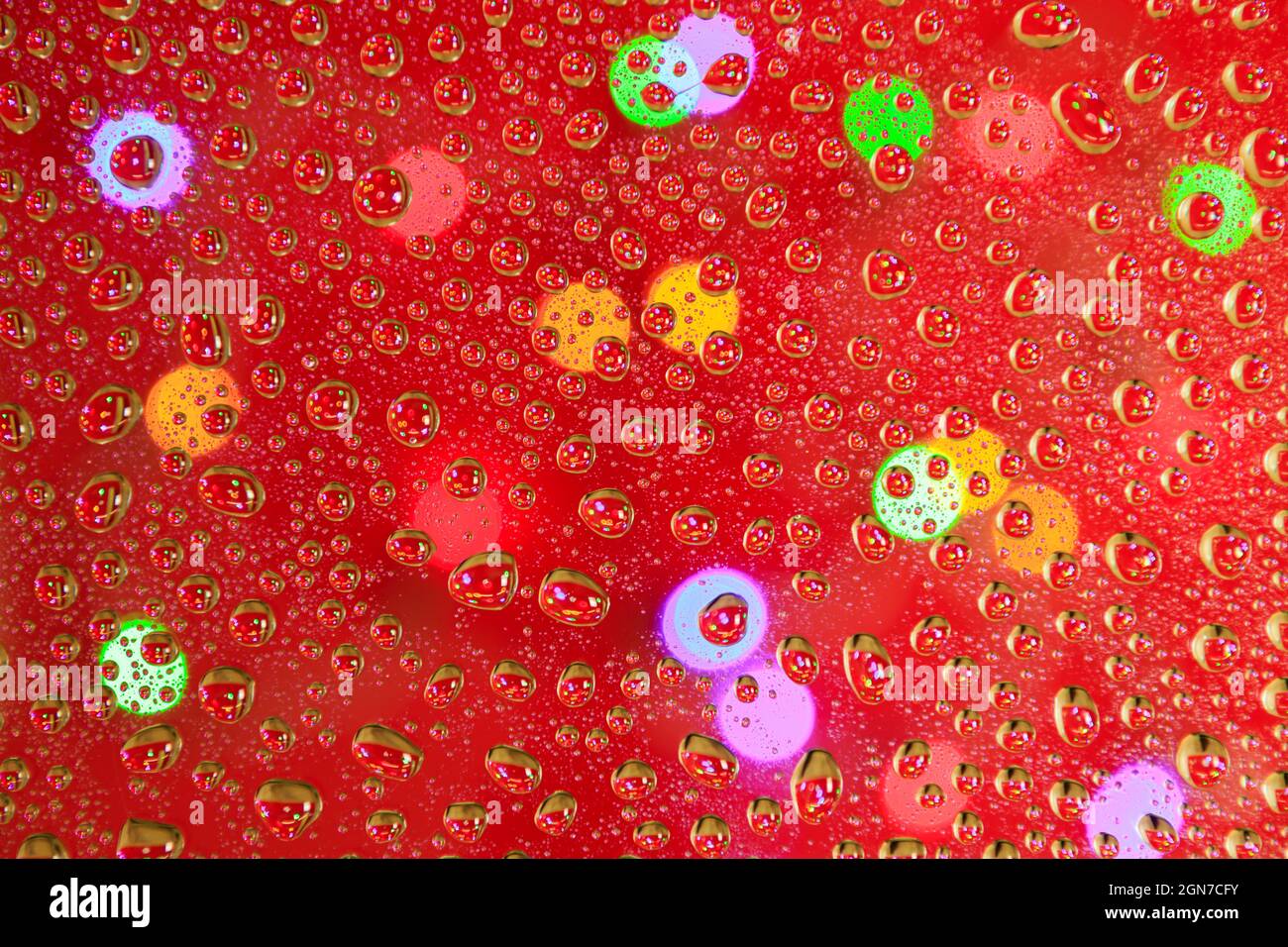 Multi colour water droplet background Stock Photo - Alamy
