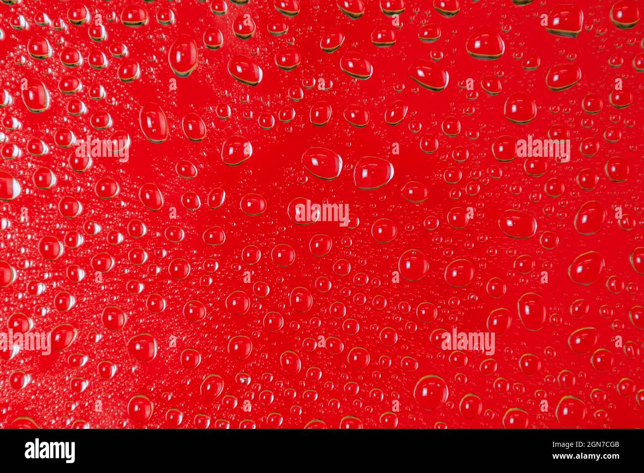 Red coloured water droplet background Stock Photo - Alamy