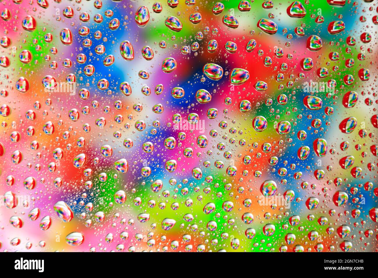 Multi colour water droplet background Stock Photo - Alamy