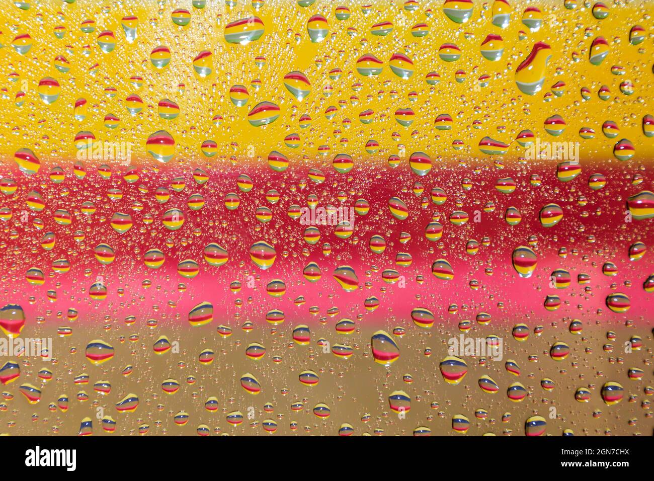 Multi colour water droplet background Stock Photo - Alamy