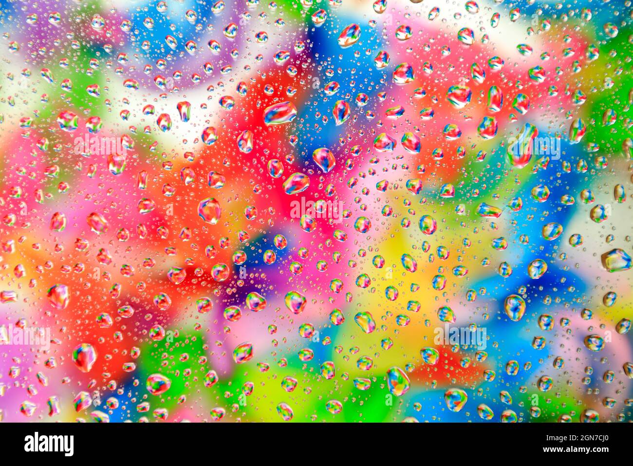 Multi colour water droplet background Stock Photo - Alamy