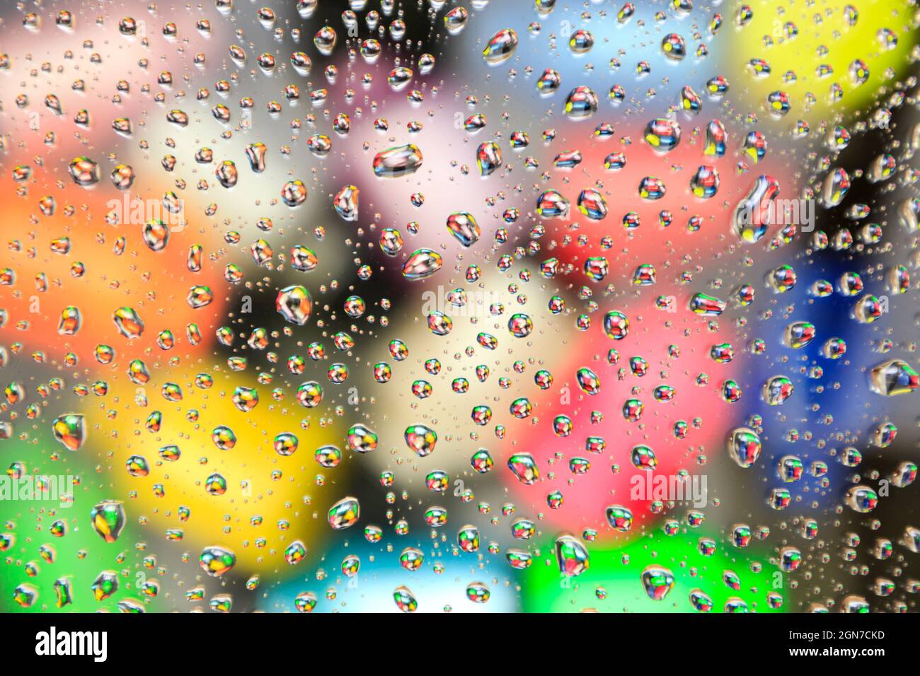 Multi colour water droplet background Stock Photo - Alamy