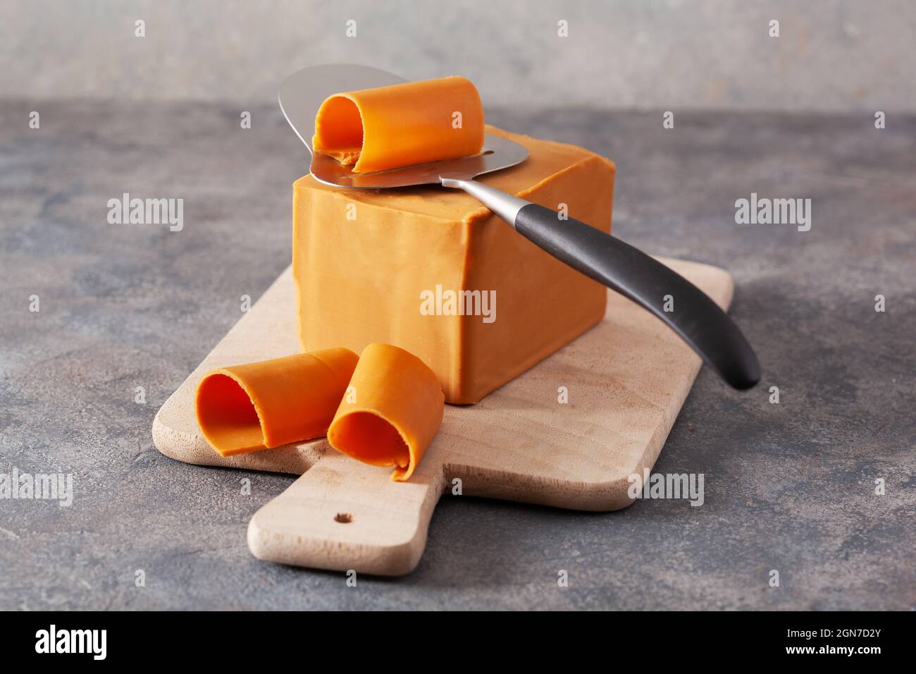 Norwegian brunost traditional brown cheese Stock Photo - Alamy