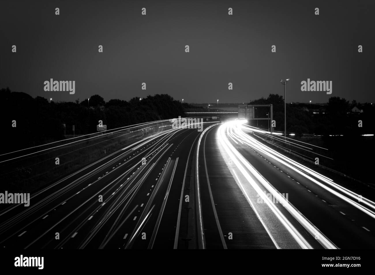 Car light trails at junction 30 of the M1 motorway, UK Stock Photo - Alamy