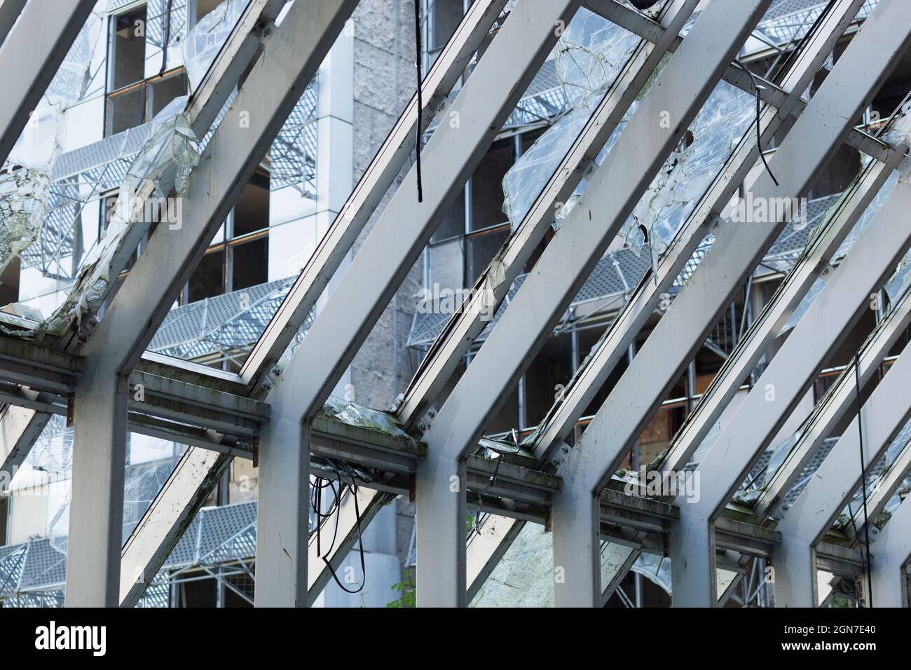 Abandoned building construction with smashed windows with leftover ...
