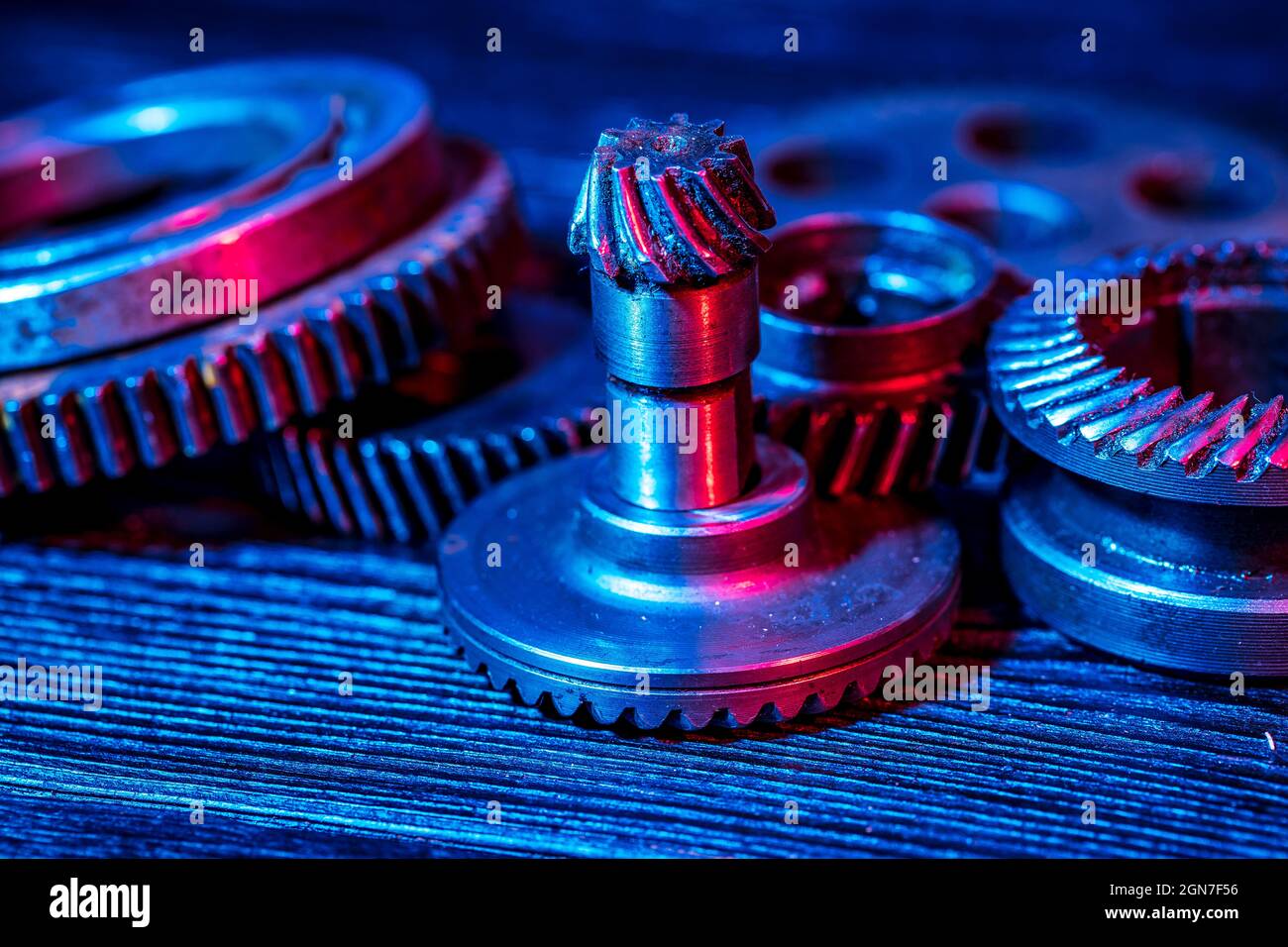 Gears. Machine part. Neon color Stock Photo - Alamy
