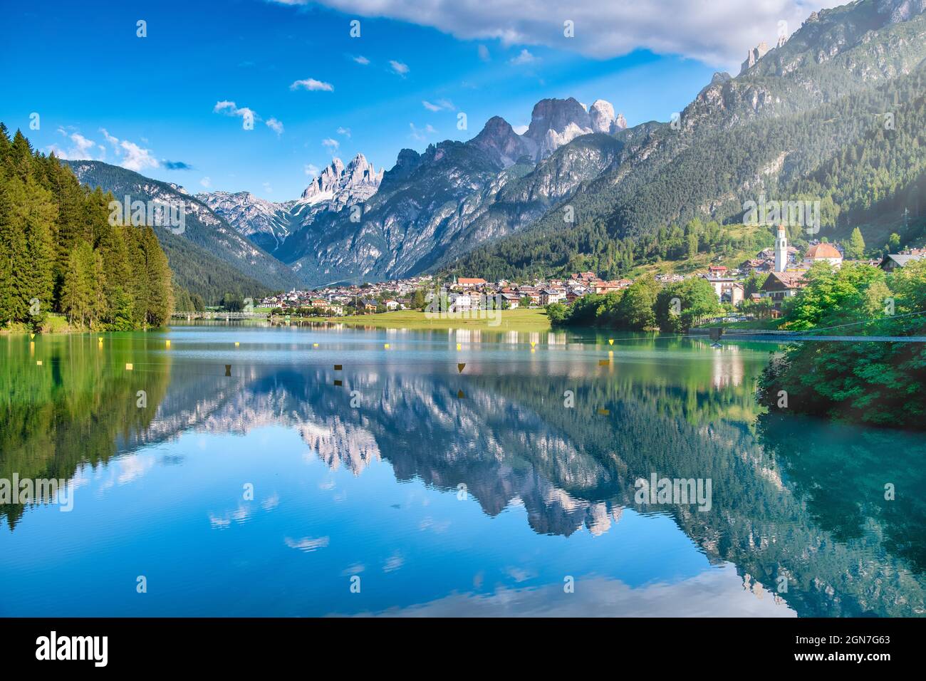 Auronzo Lake and town in summer season, Italian Alps Stock Photo - Alamy