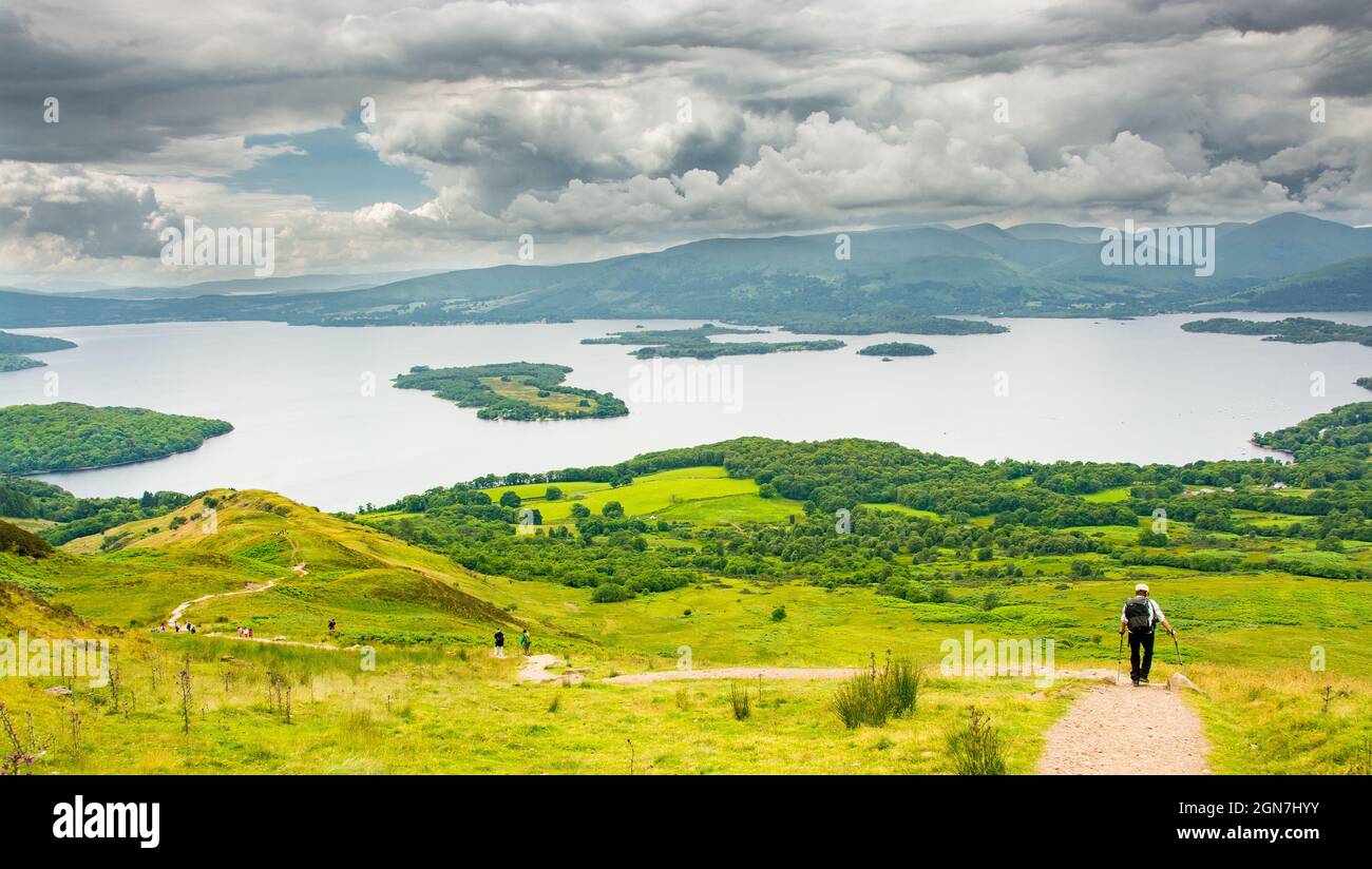 Person walking down path scotland hi-res stock photography and images ...