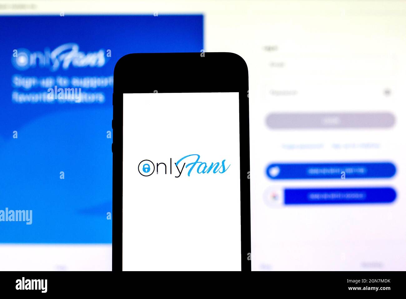 In this photo illustration an OnlyFans logo seen displayed on a ...