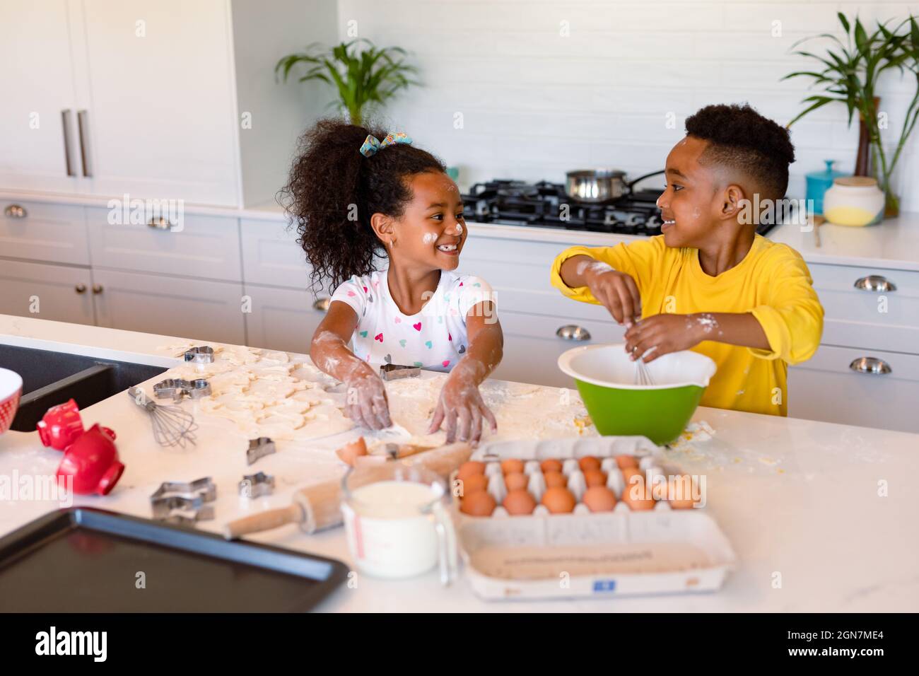 Siblings Cooking In Kitchen High Resolution Stock Photography and ...