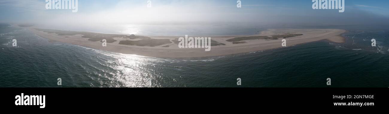 The cold water of the Atlantic Ocean washes onto a scenic beach in ...